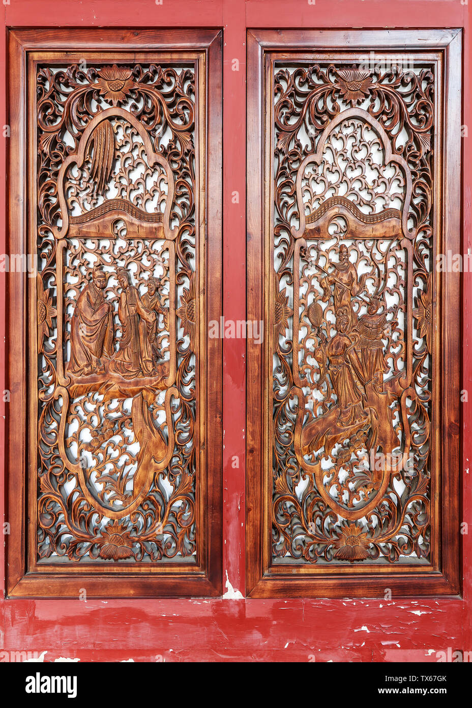 Red carved hollowed-out doors and windows Stock Photo - Alamy