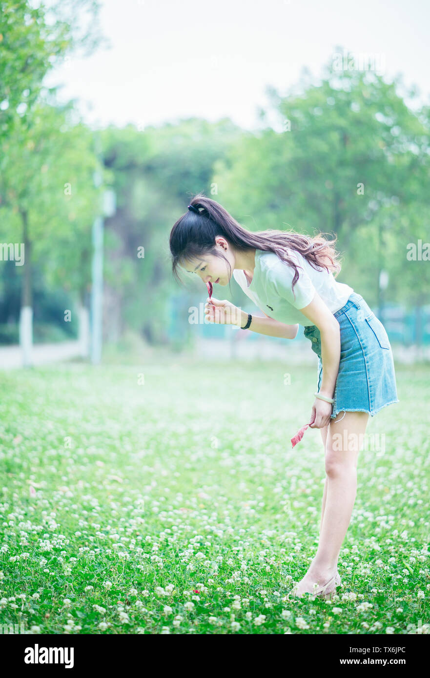 Girl on the lawn Stock Photo - Alamy