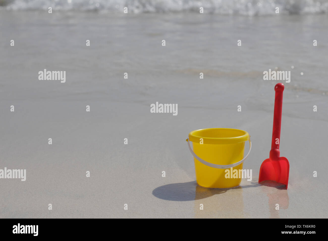 Red sand bucket hi-res stock photography and images - Alamy