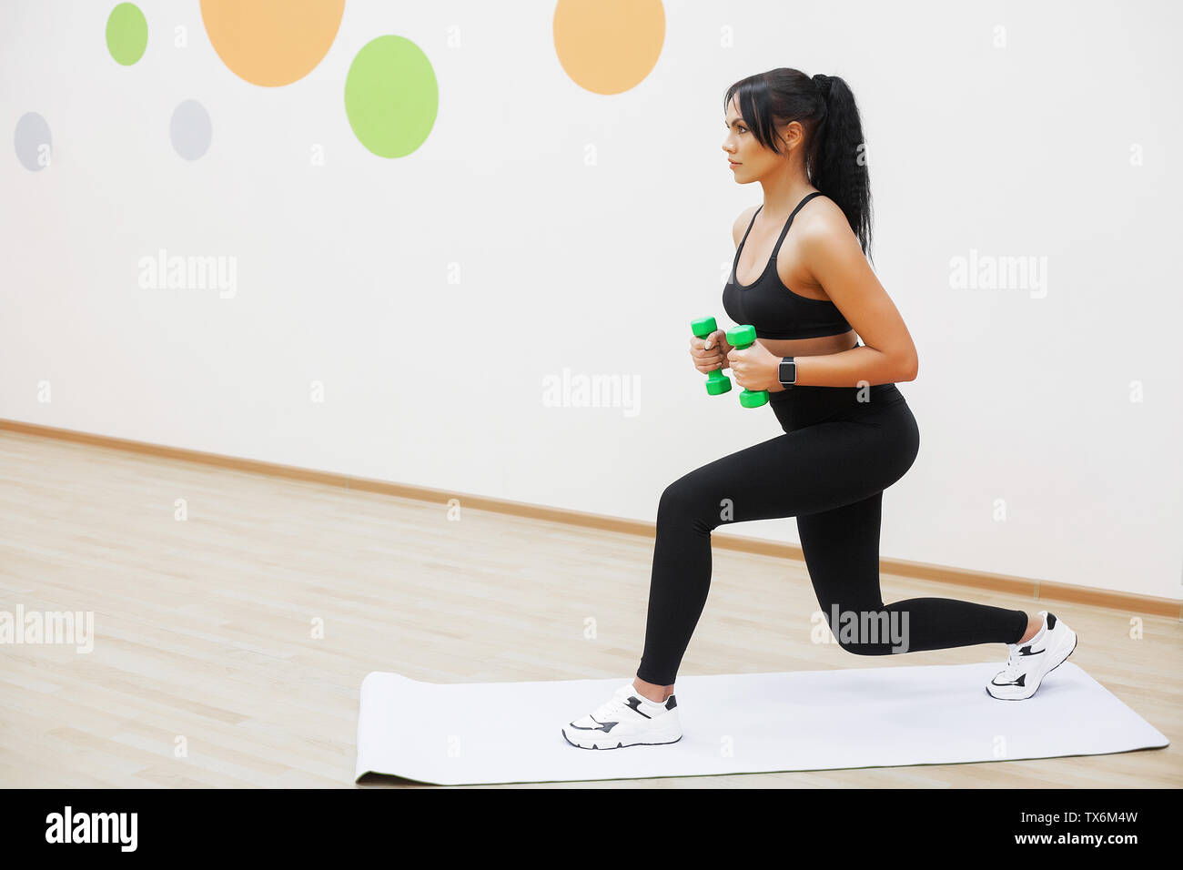 Fitness woman. Sports girl in the gym doing exercises Stock Photo - Alamy