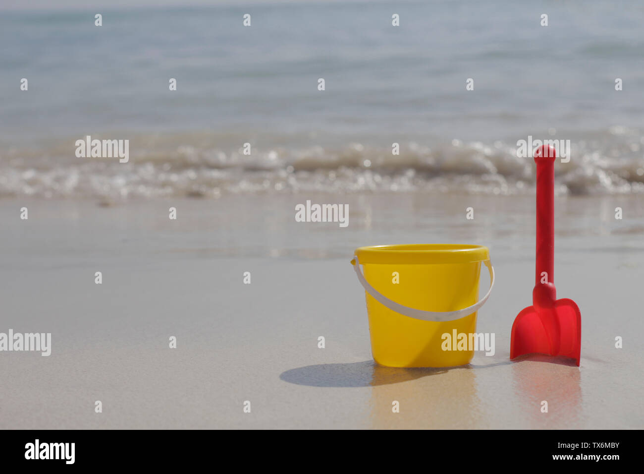 Red sand bucket hi-res stock photography and images - Alamy