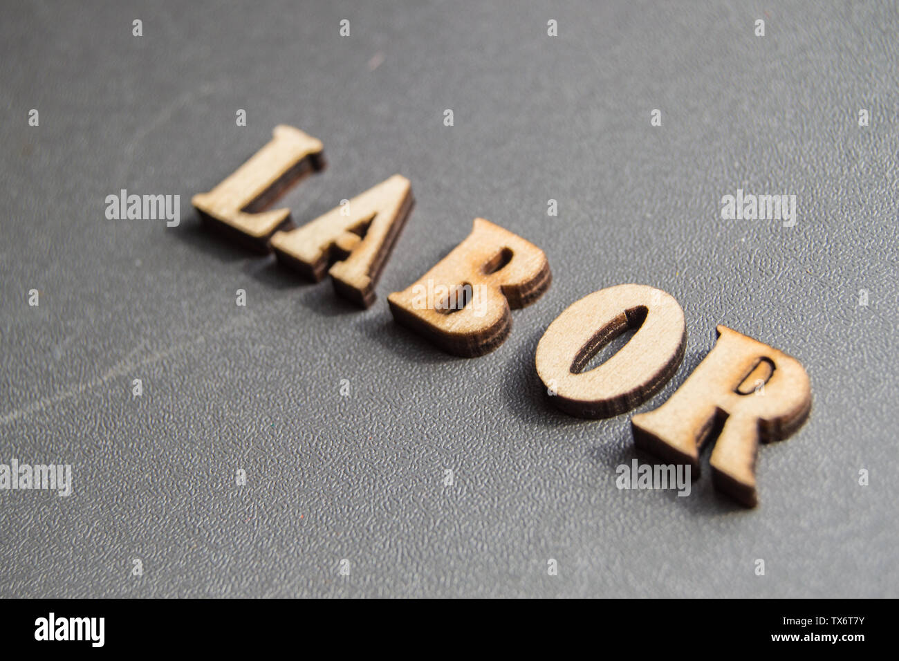 Word labor on gray background with copy space and space for text ...