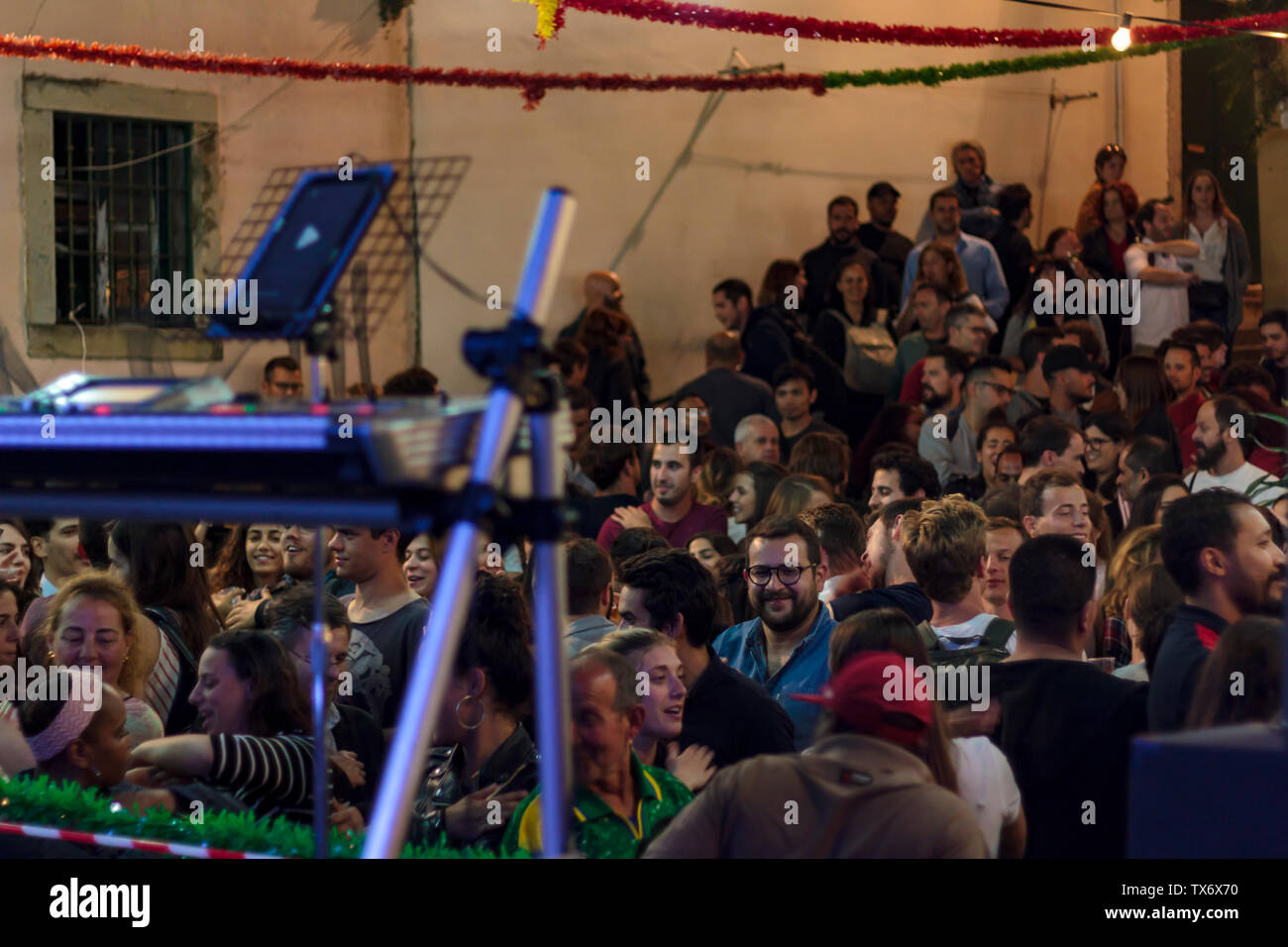 LISBON, PORTUGAL - JUNE 21, 2018: Crowd of people dancing on a street ...