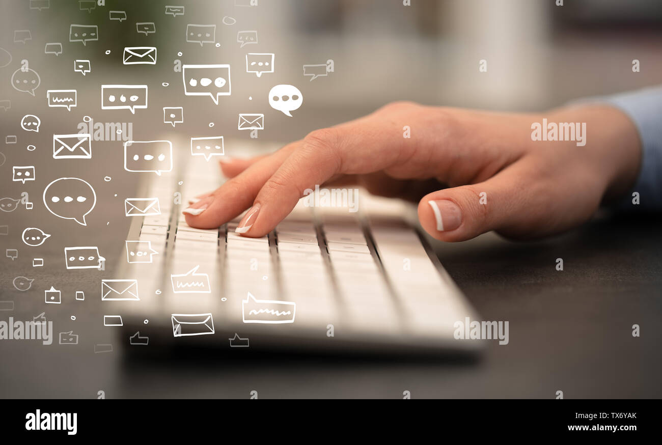 Business woman hand typing on keyboard with chat icons around Stock ...