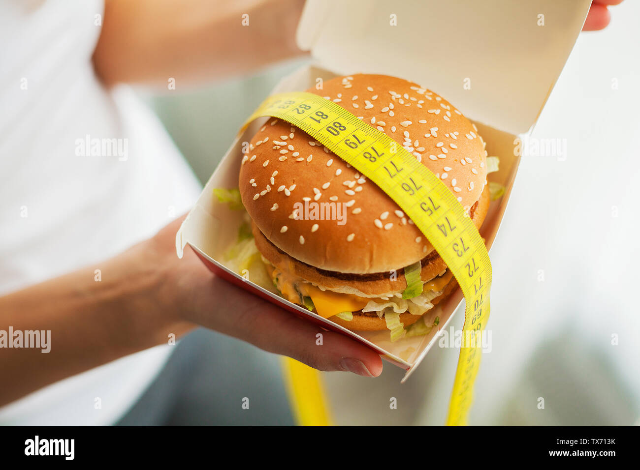 Diet And Fast Food Concept. Overweight Woman Standing On Weighin Stock ...