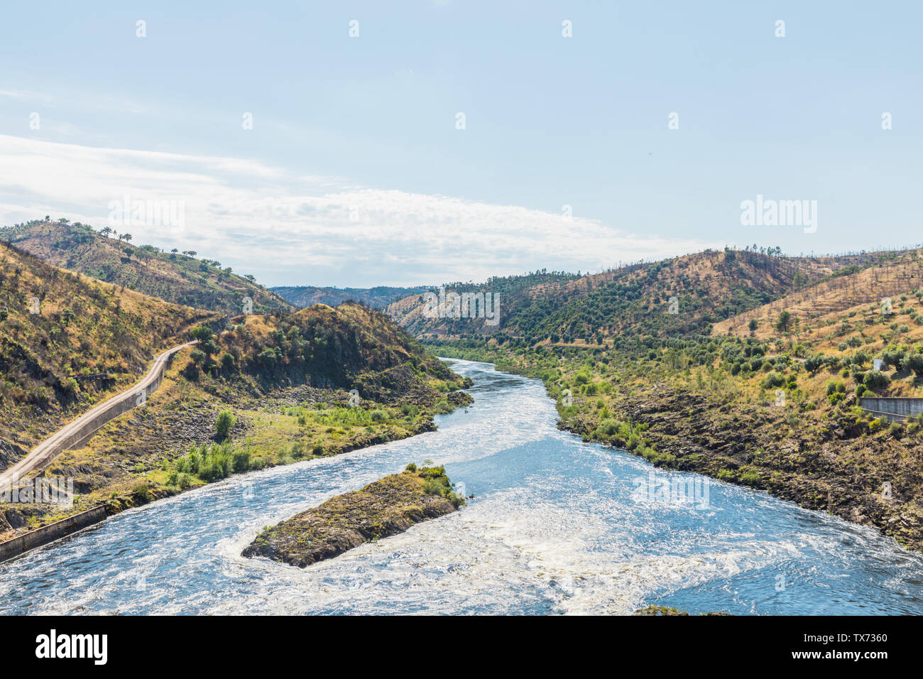 Landscape over the dam of Barragem do Fratel in Portugal during summer ...