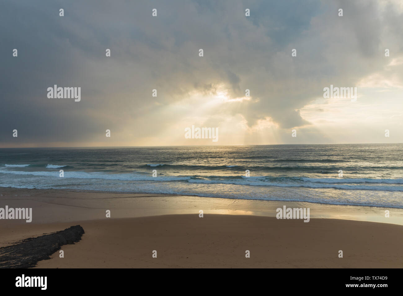 Sunset behind clouds. Atlantic ocean Stock Photo - Alamy