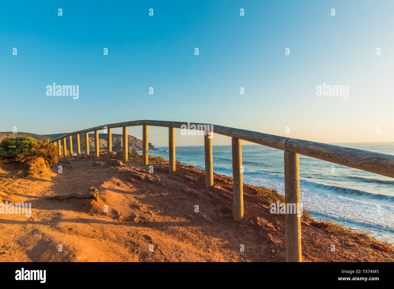 Wooden path on the beach of a natural park in Portugal with ocean view ...