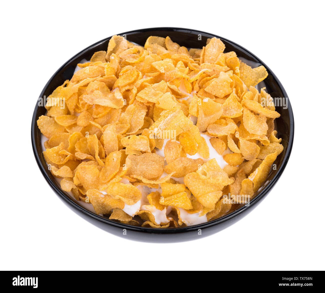 Corn flakes with milk isolated on white background Stock Photo - Alamy