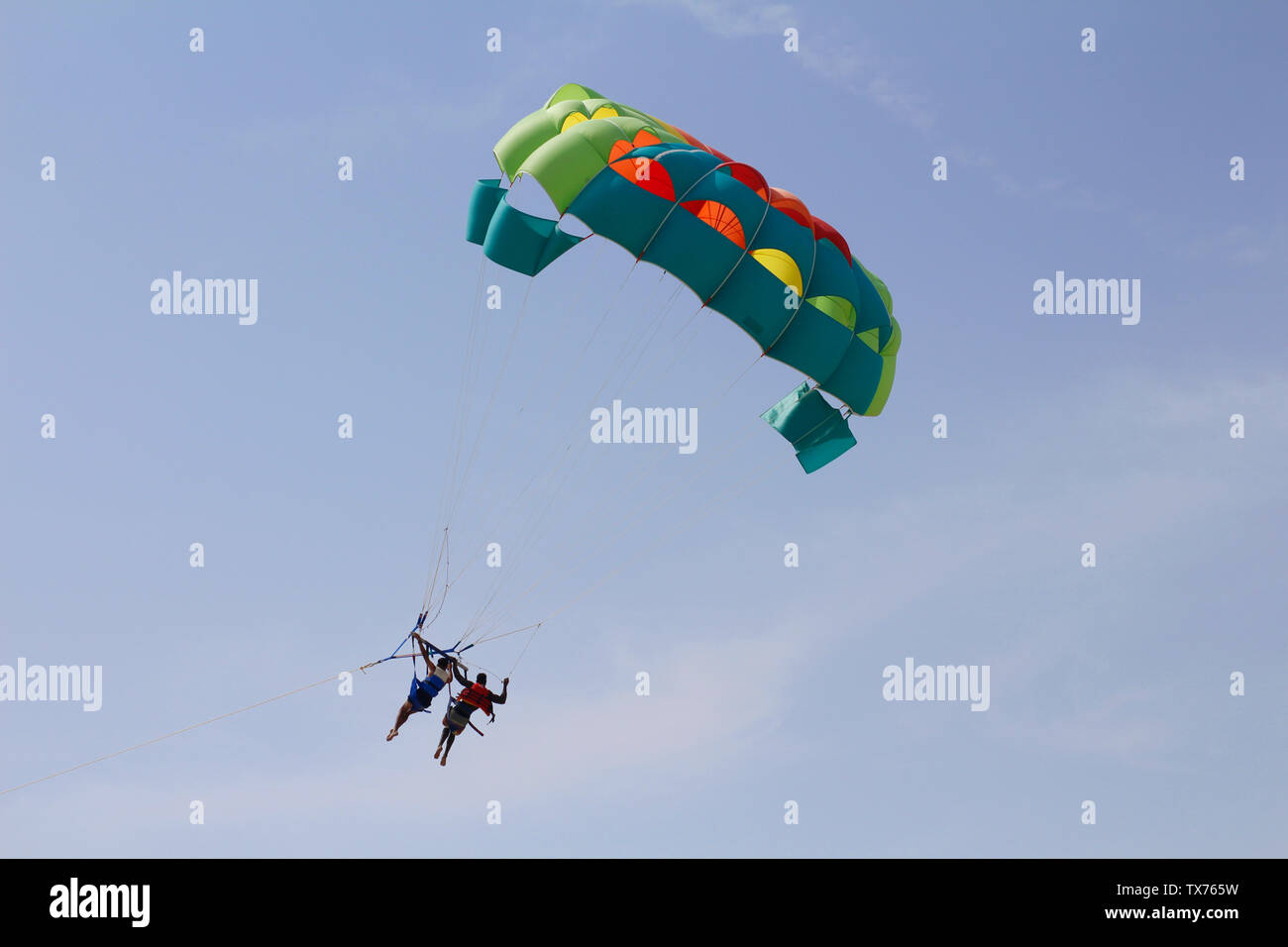 Parasales - water parachutes for outdoor activities. In the blue sky a ...