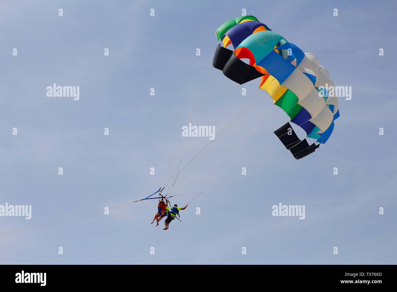 Parasales - water parachutes for outdoor activities. In the blue sky a ...
