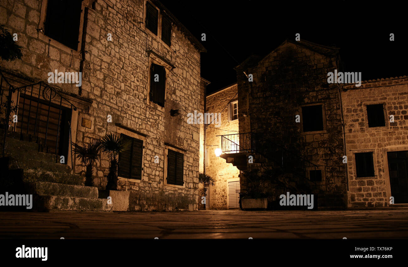 Night walk through ancient medieval town Stari grad on Hvar island in ...