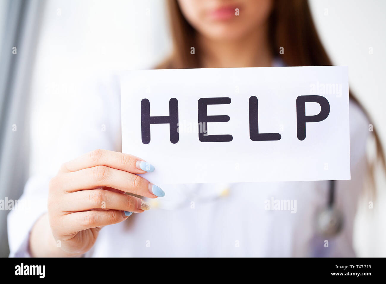 Health Care. Doctor Holding a Card With Symbol SOS, Medical Concept ...