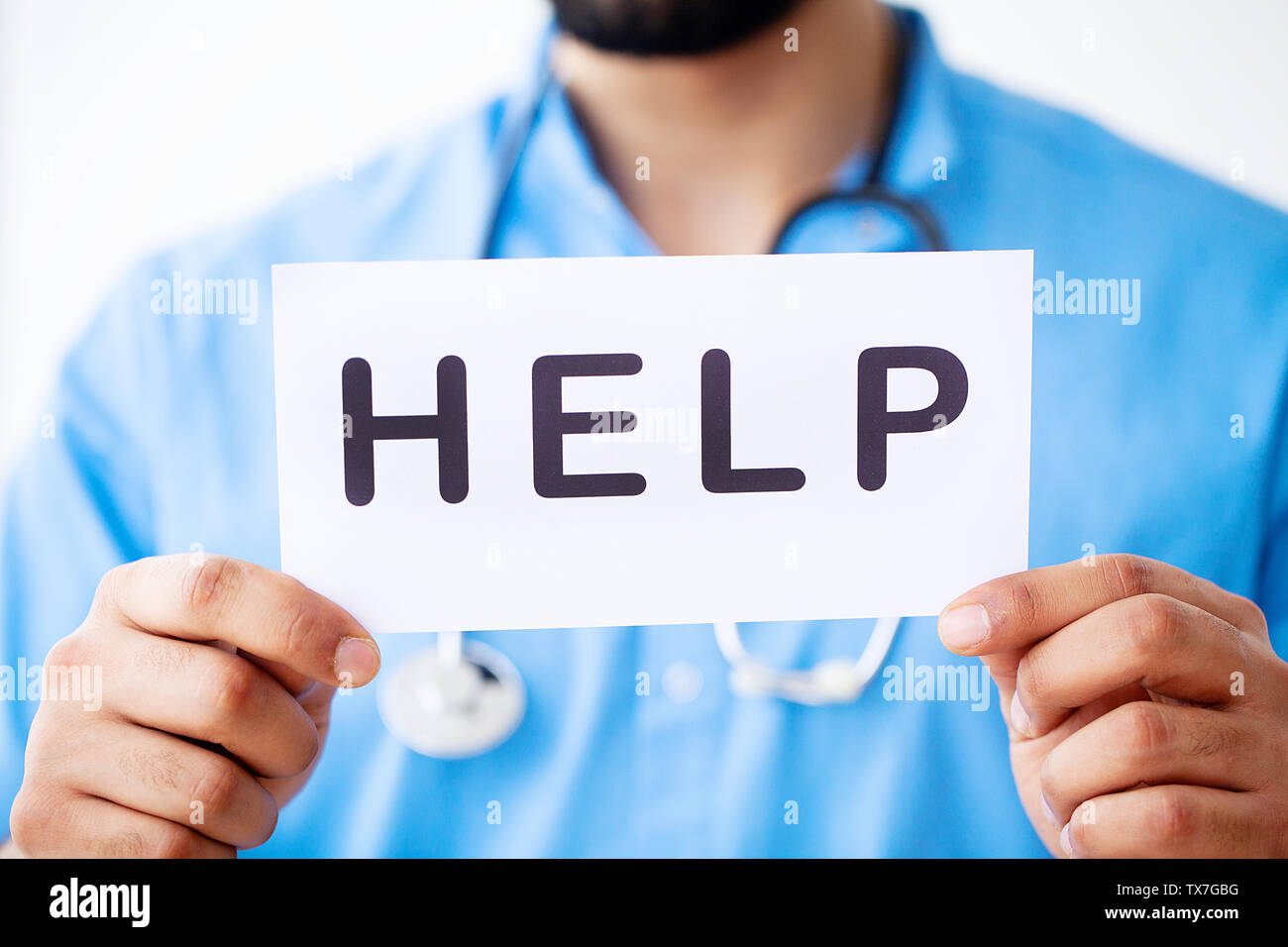 Health Care. Doctor Holding a Card With Symbol SOS, Medical Concept ...