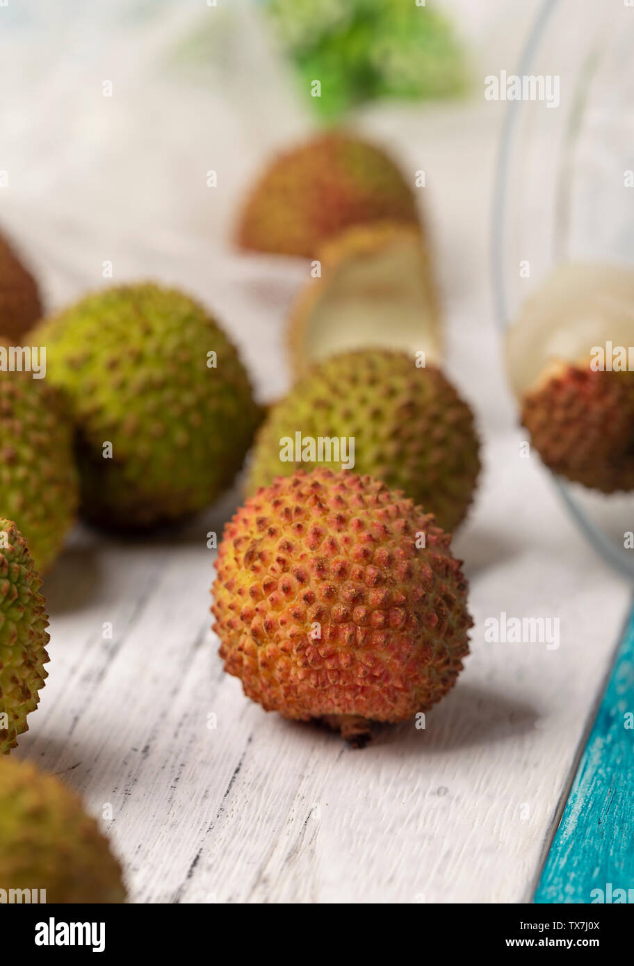 Fresh lychee on the table Stock Photo - Alamy