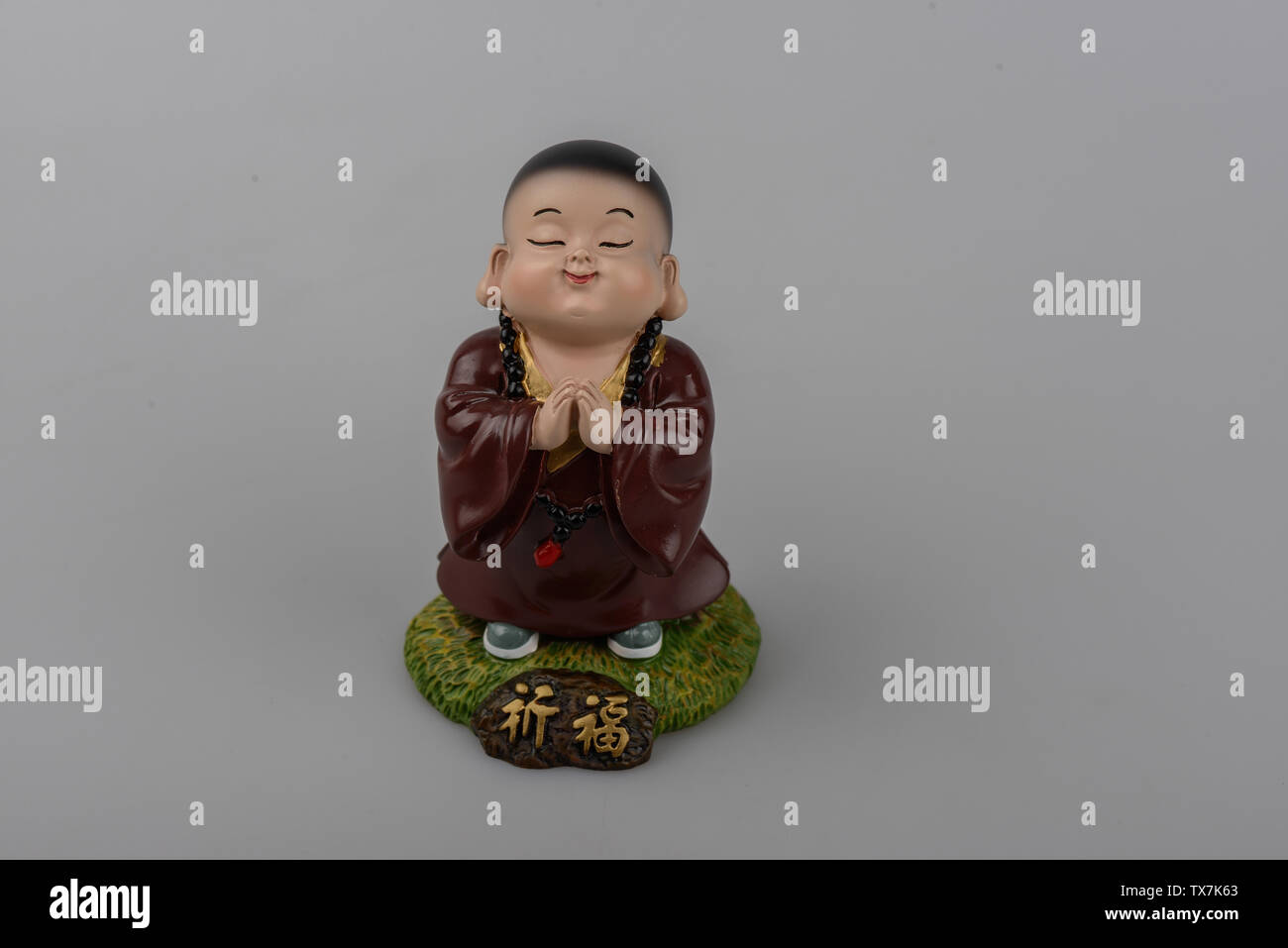 Little monk car furnishings Stock Photo - Alamy