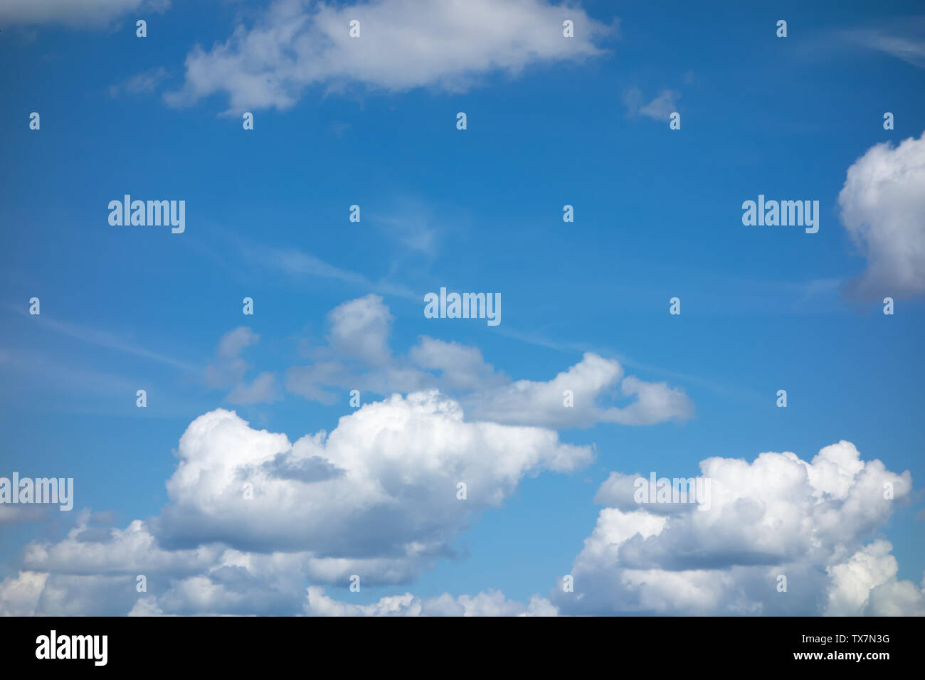 blue sky with flying white light clouds Stock Photo - Alamy