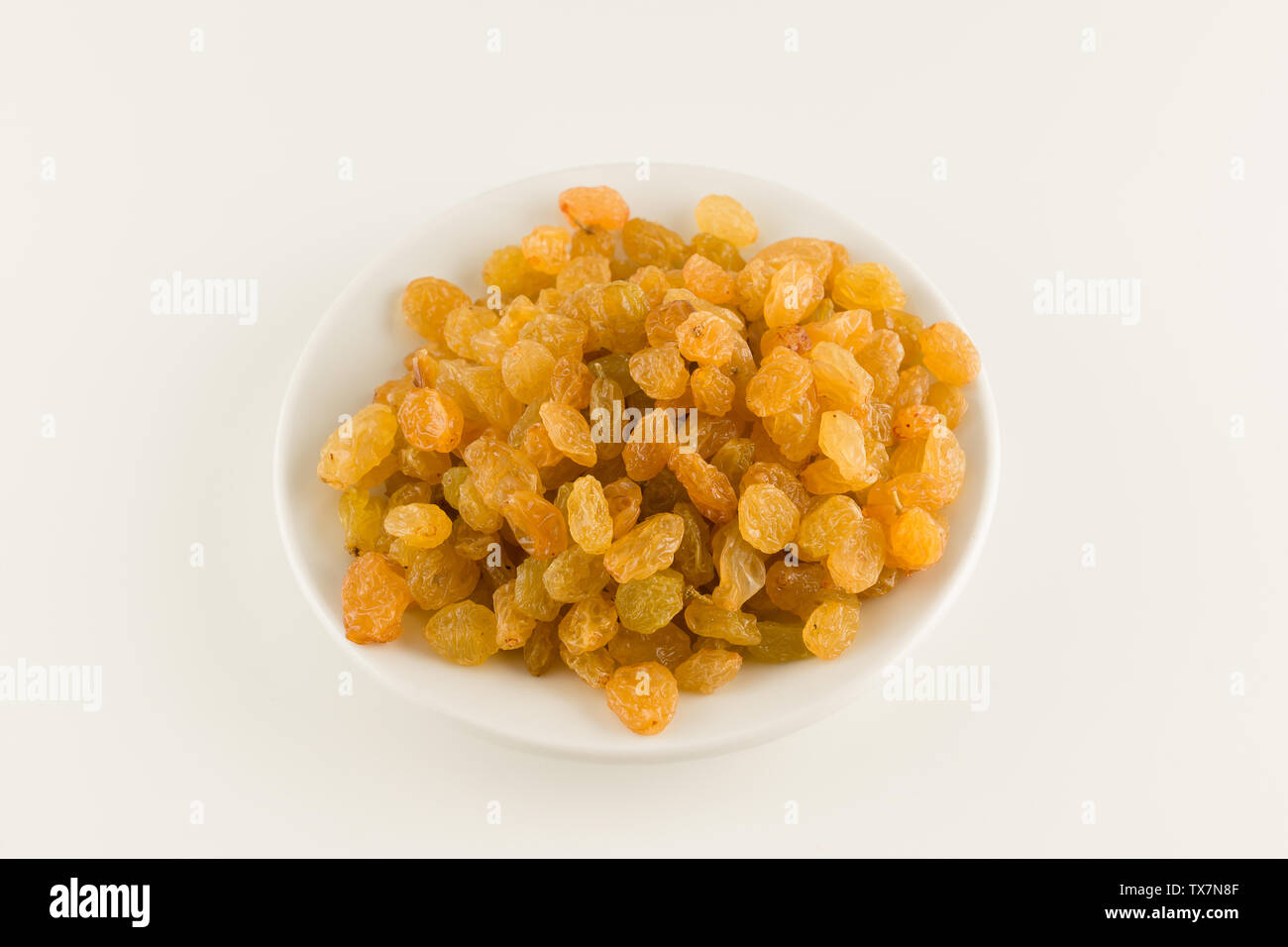 Fresh picked raisins isolated on white background and ready to eat ...