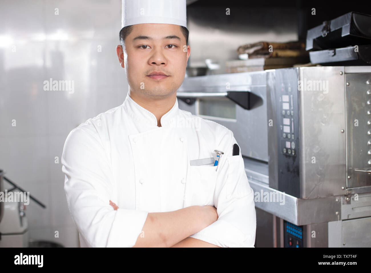Chinese young man kitchen hi-res stock photography and images - Alamy