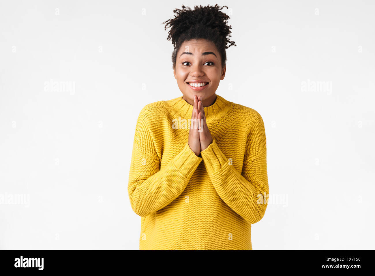Photo of a beautiful young african emotional woman posing isolated over ...