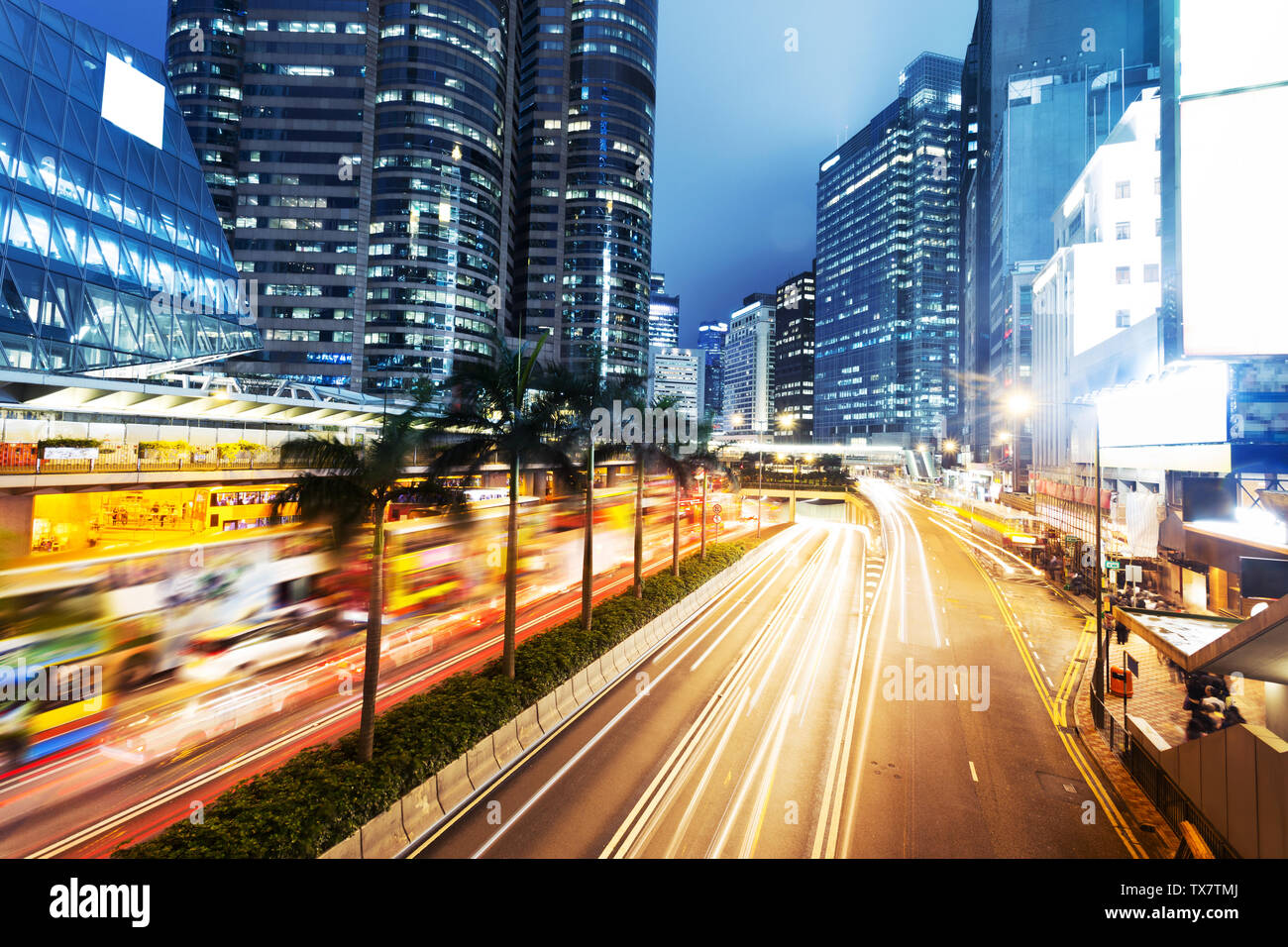 modern urban city traffic trails with cityscape background Stock Photo ...