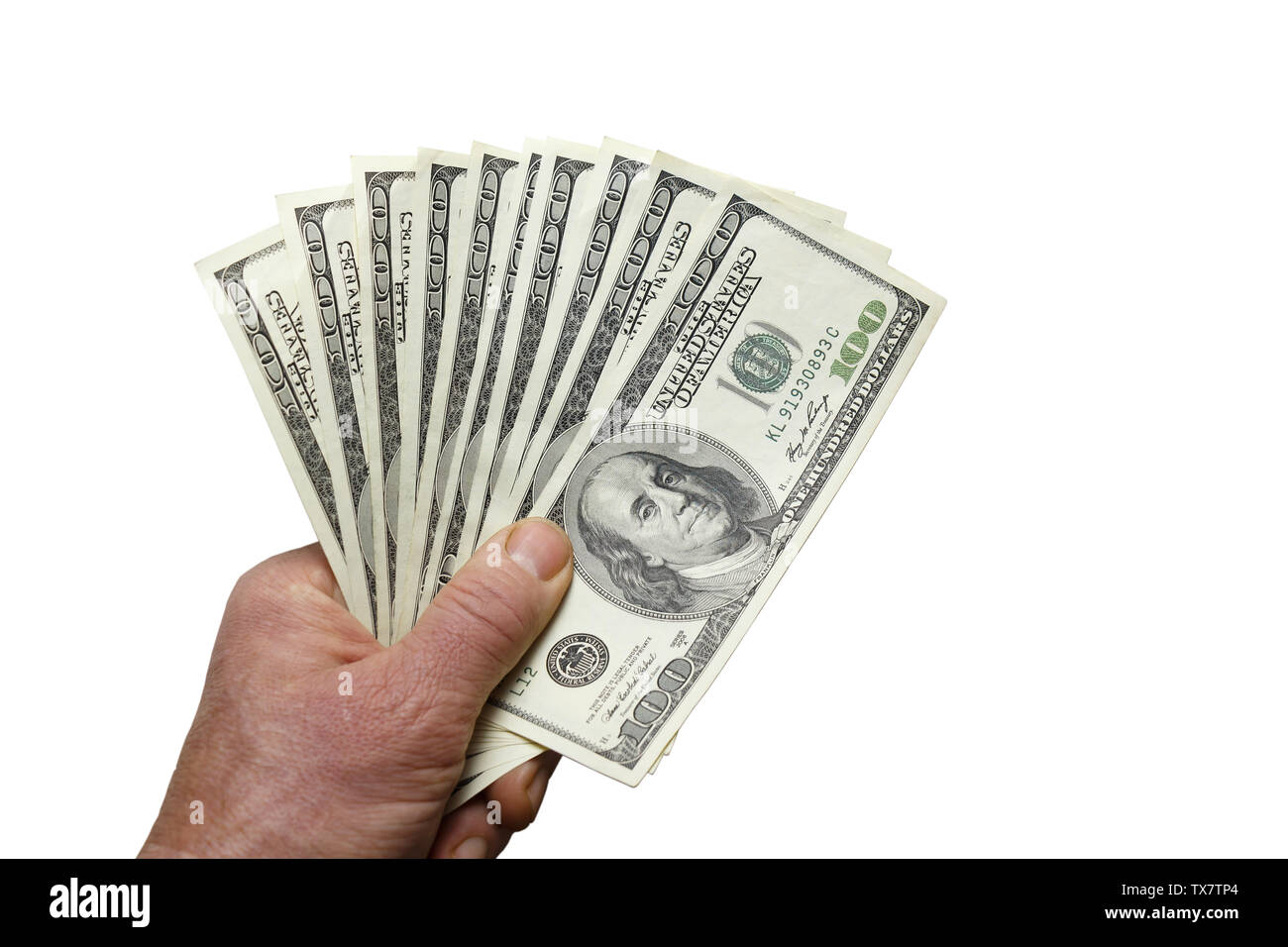 a thousand dollars in hand. isolate Stock Photo - Alamy