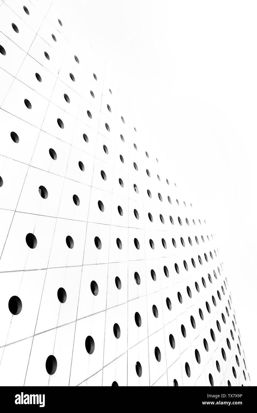 Geometry of the exterior walls of minimalist buildings Stock Photo - Alamy