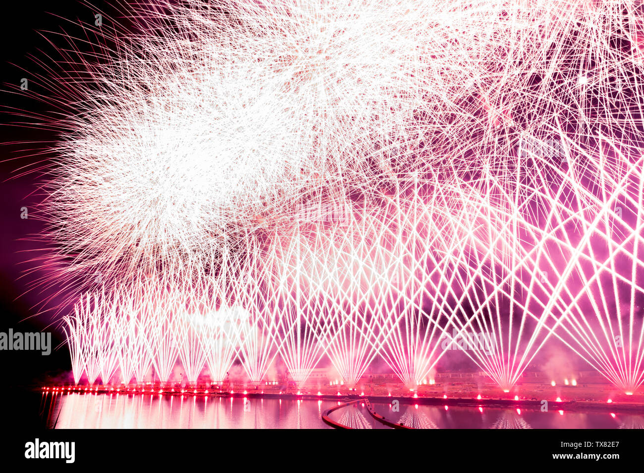All kinds of firecrackers bloom in the air Stock Photo - Alamy