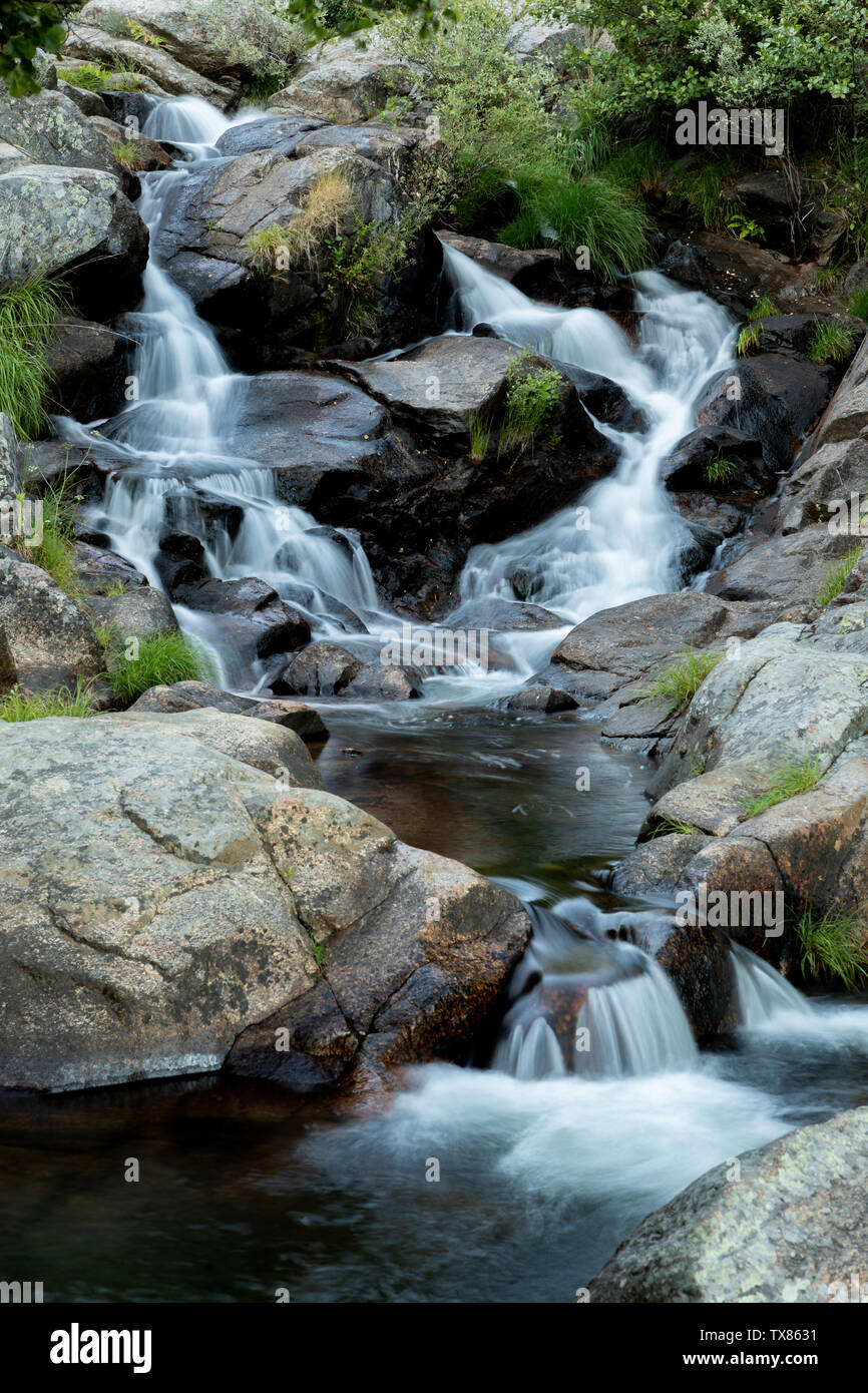 Beautiful waterfall falling on the stones Stock Photo - Alamy