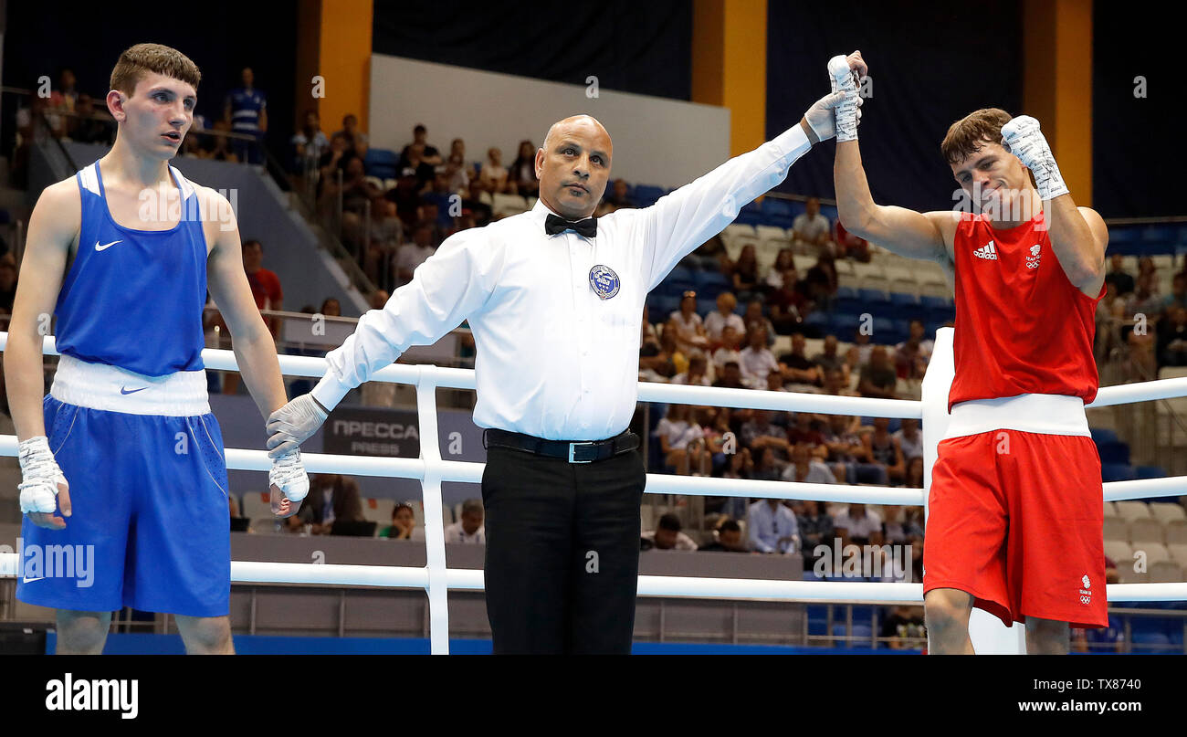 Great Britain's Pat McCormack (right) celebrates winning his ...