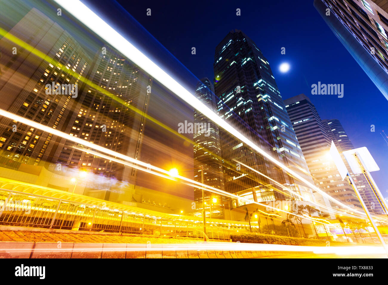 traffic light trails in modern city at night Stock Photo - Alamy