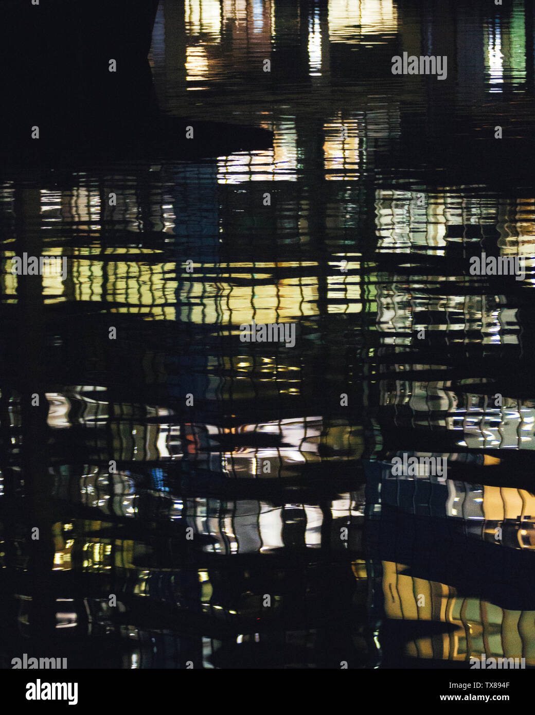 Light reflections on water from the buildings by the South Dock in ...