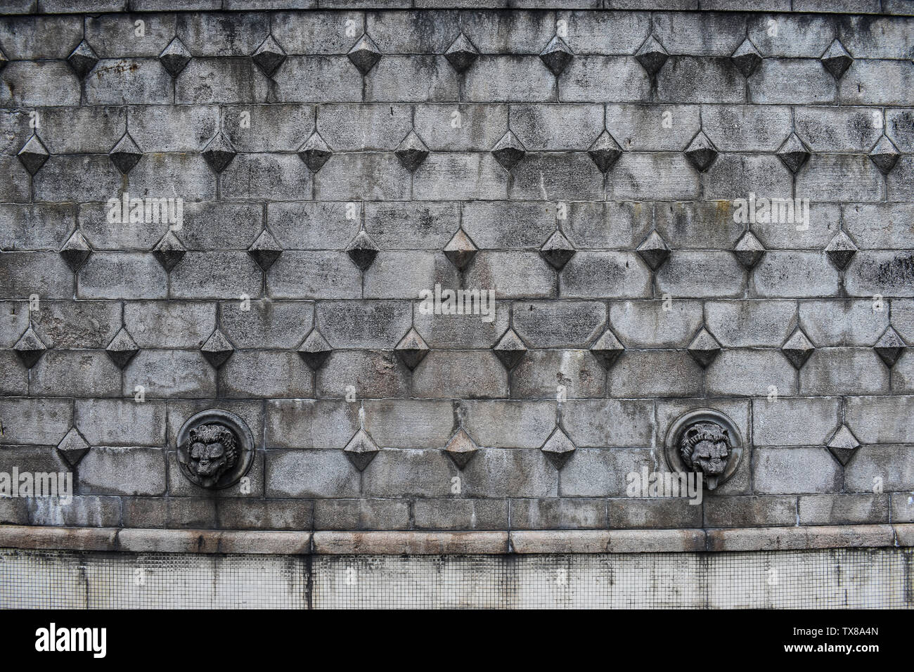 Ancient stone blocks pattern on the fortress wall surface. Gray stone ...