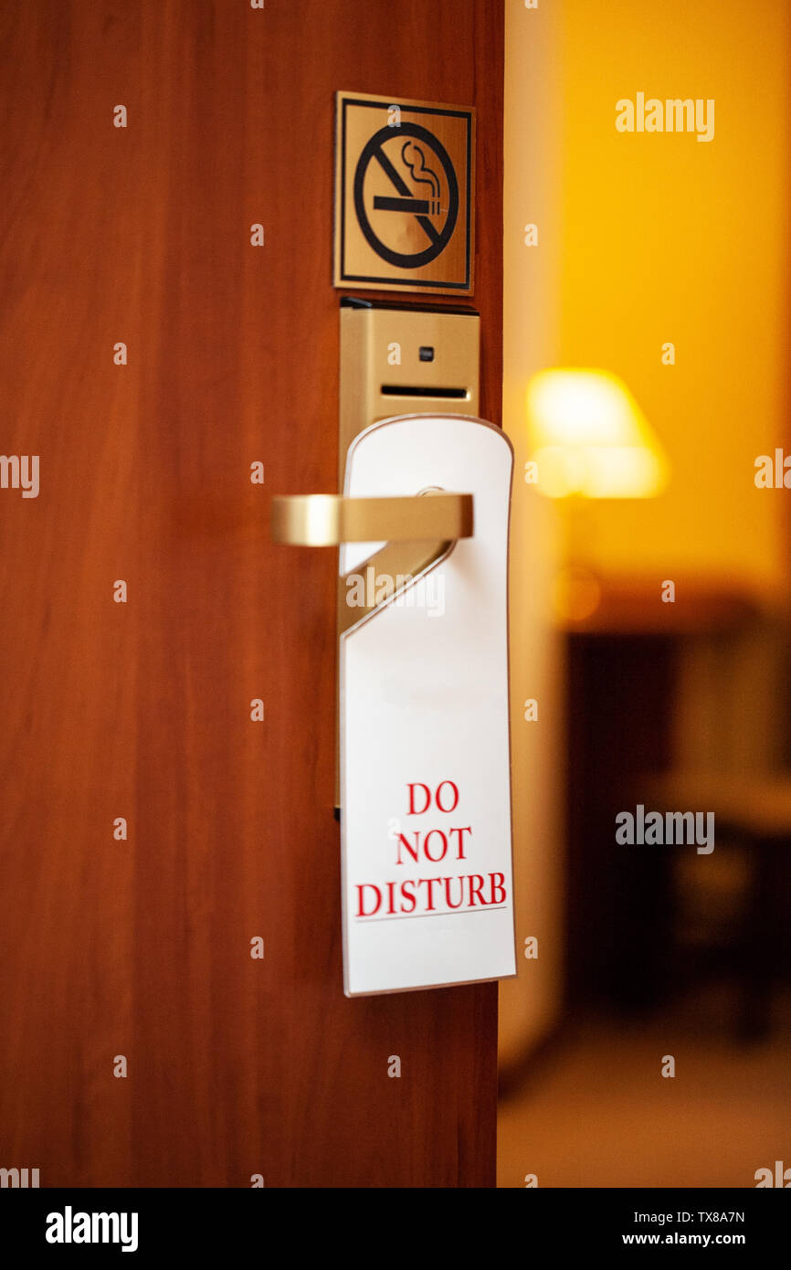The hotel room with DO NOT DISTURB sign on the door Stock Photo - Alamy