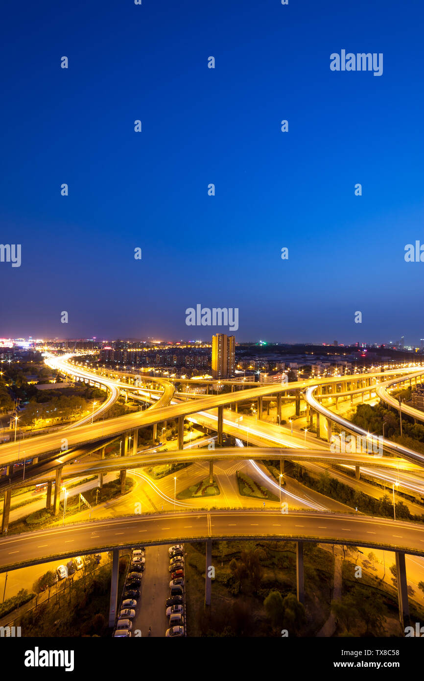 Highway at night in modern city Stock Photo - Alamy