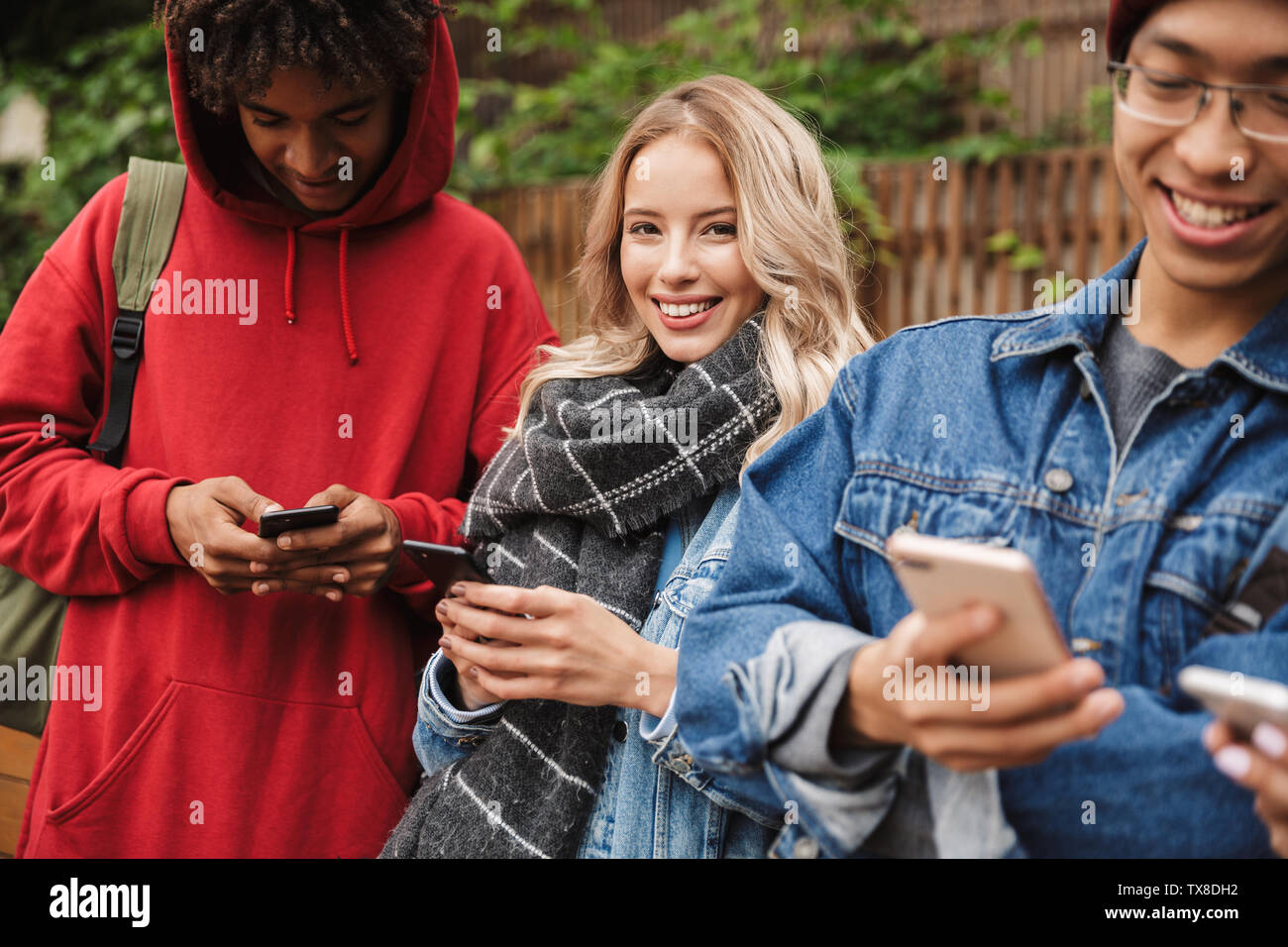 Group if cheerful multiethnic friends teenagers spending fun time ...