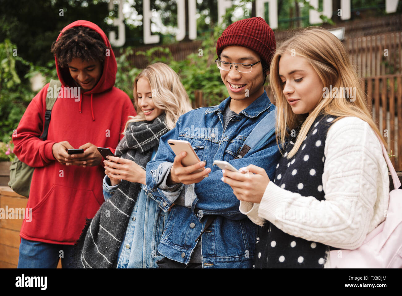 Group if cheerful multiethnic friends teenagers spending fun time ...