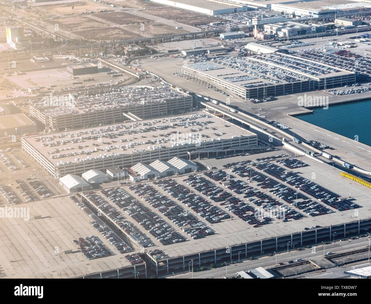 Aerial view new cars lined up at distribution centre. Cars distribution ...