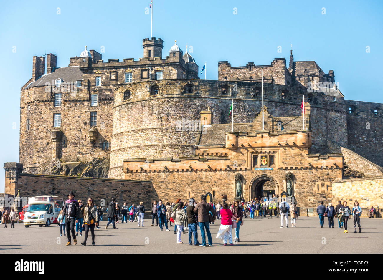Wide view of visitors on the esplanade, with others going in an out of ...