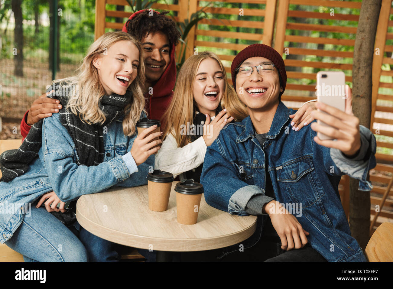 Group teenagers cafe hi-res stock photography and images - Alamy