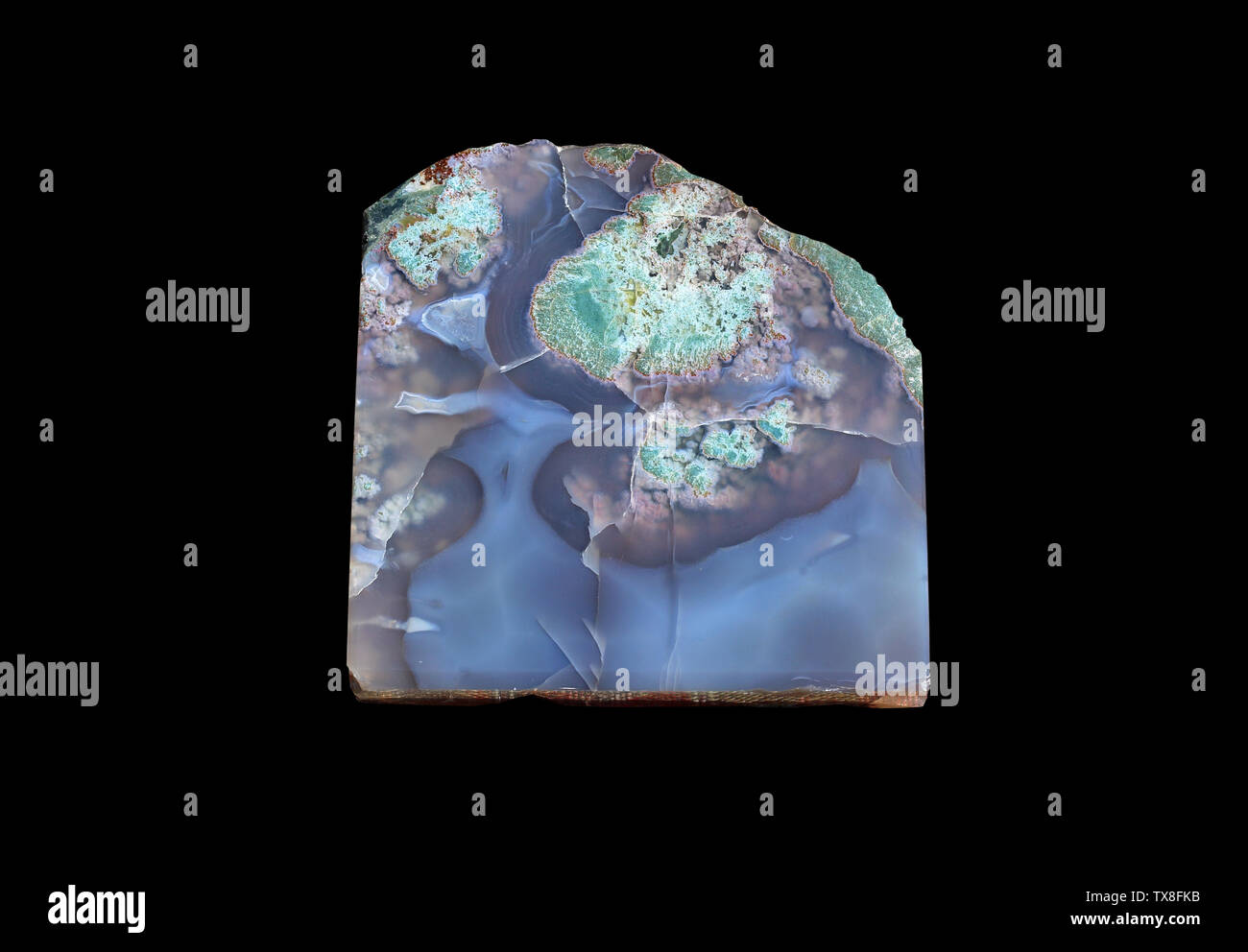 Cut mineral exposing layers of different colors Stock Photo - Alamy