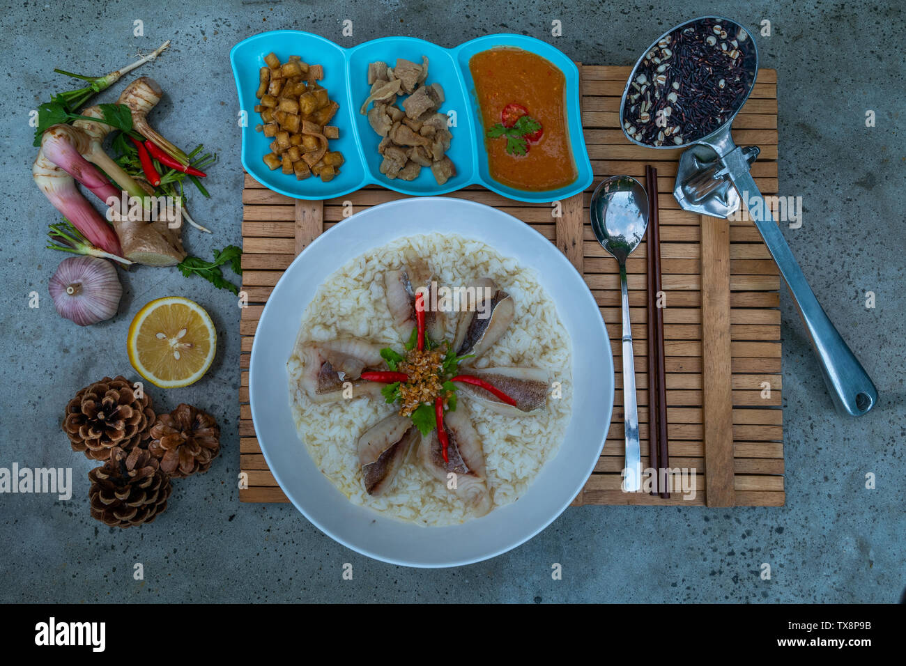 Fish boiled rice. Congee or conjee is a type of rice porridge or gruel ...