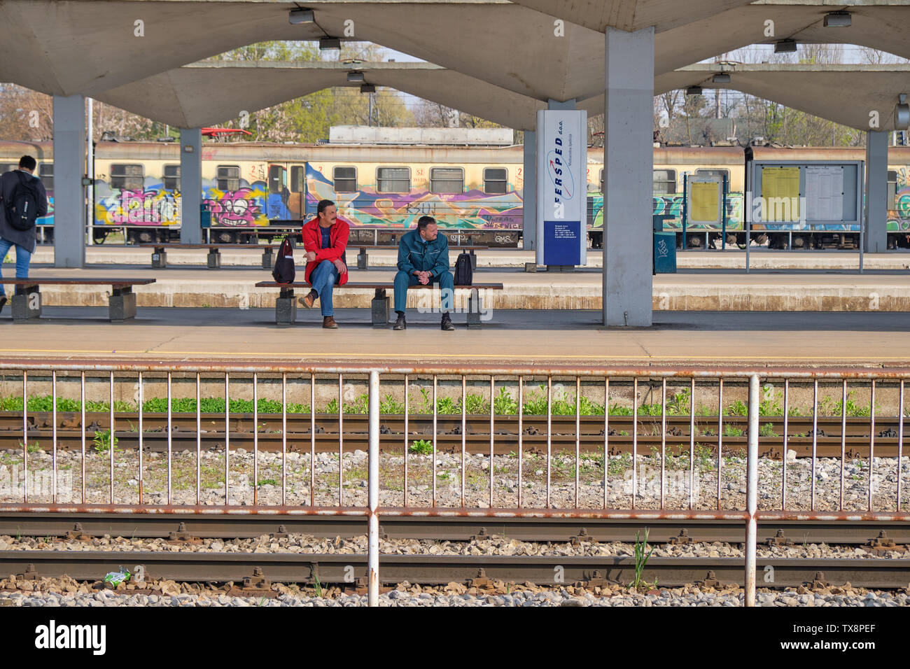 Two people sitting in railway hi-res stock photography and images - Alamy