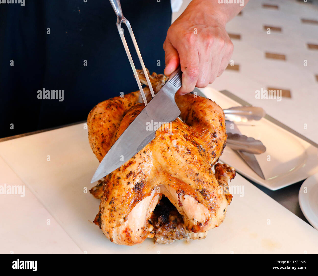 Chef carving meat table hi-res stock photography and images - Alamy