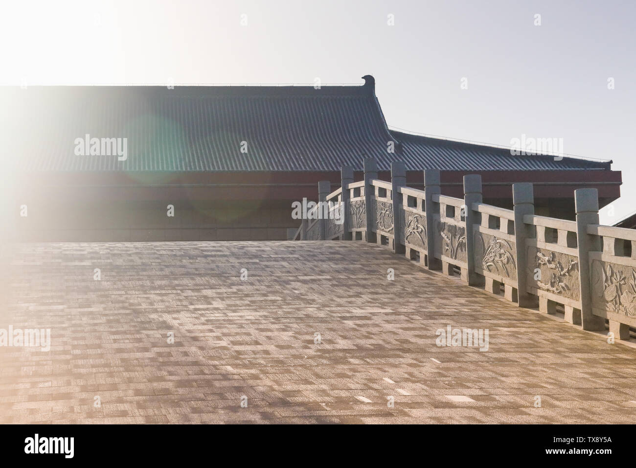Stone bridge railings in backlight with palace Stock Photo - Alamy