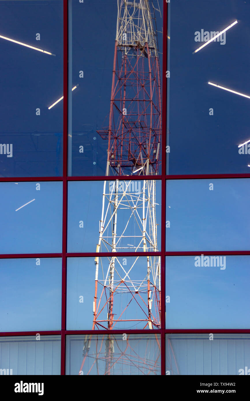 Reflection of radio transmission tower with cellular communication ...