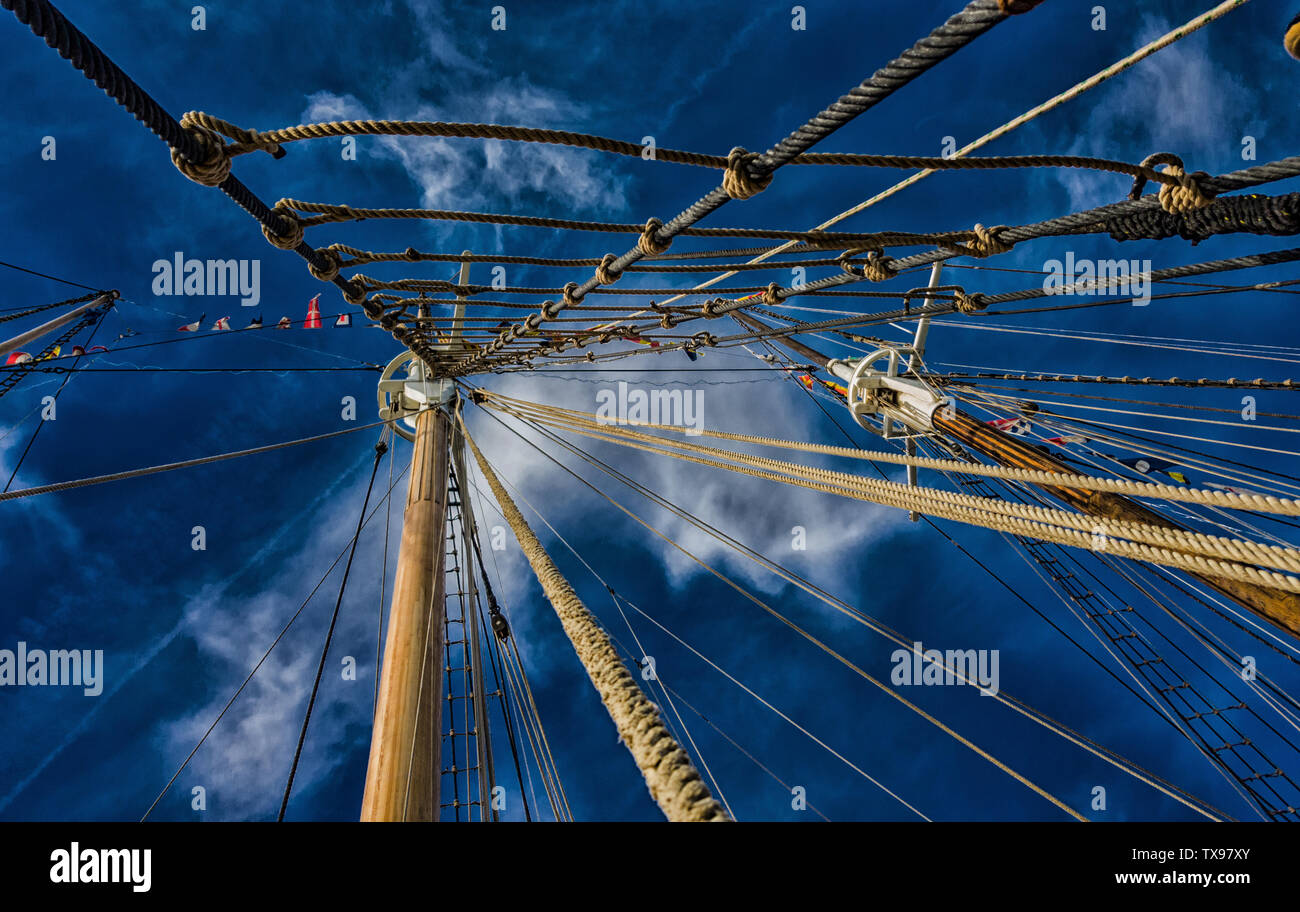 Wooden masts and rigging of a sailing vessel Stock Photo - Alamy