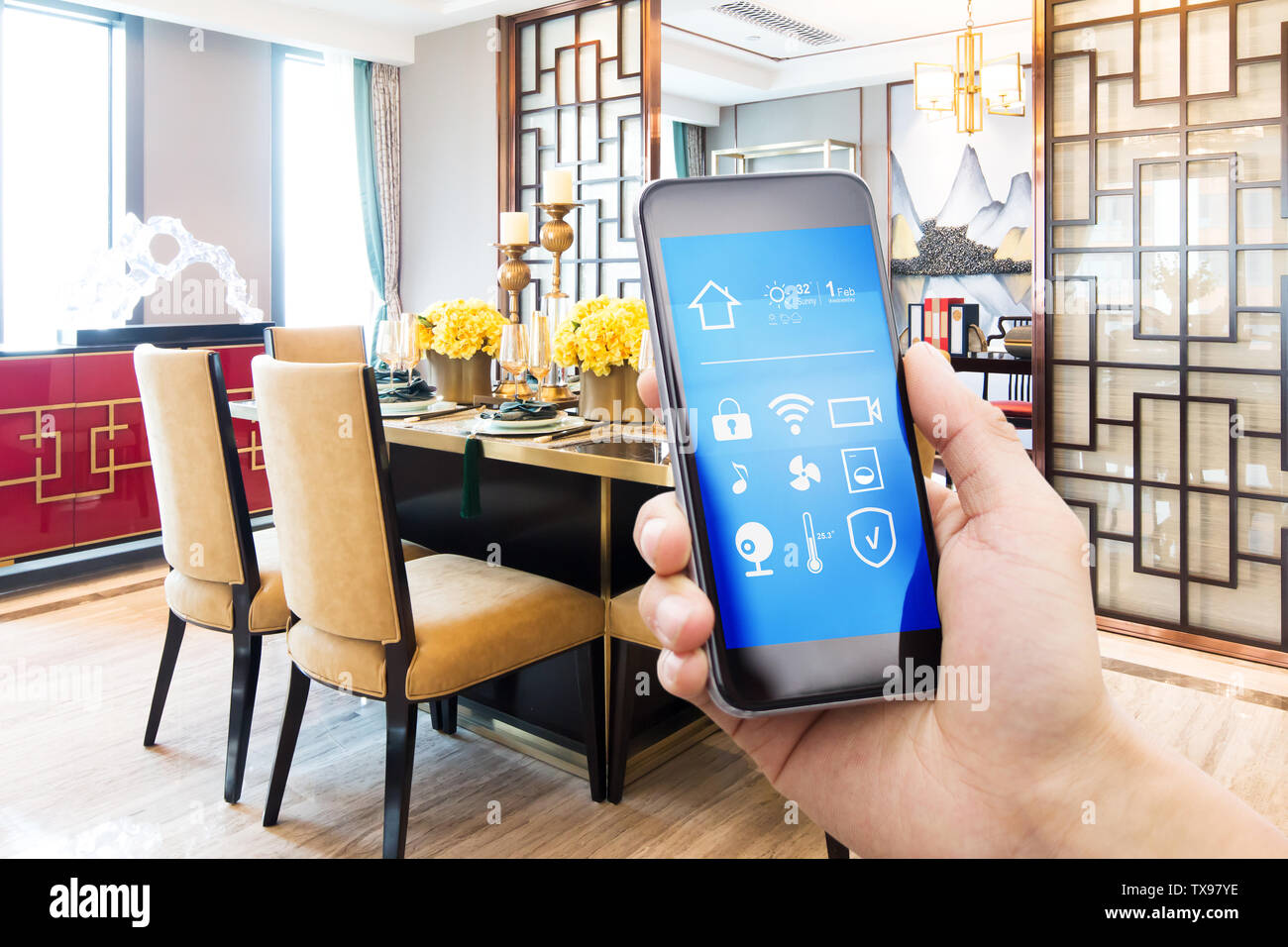 smart phone with smart home with modern dining room Stock Photo - Alamy