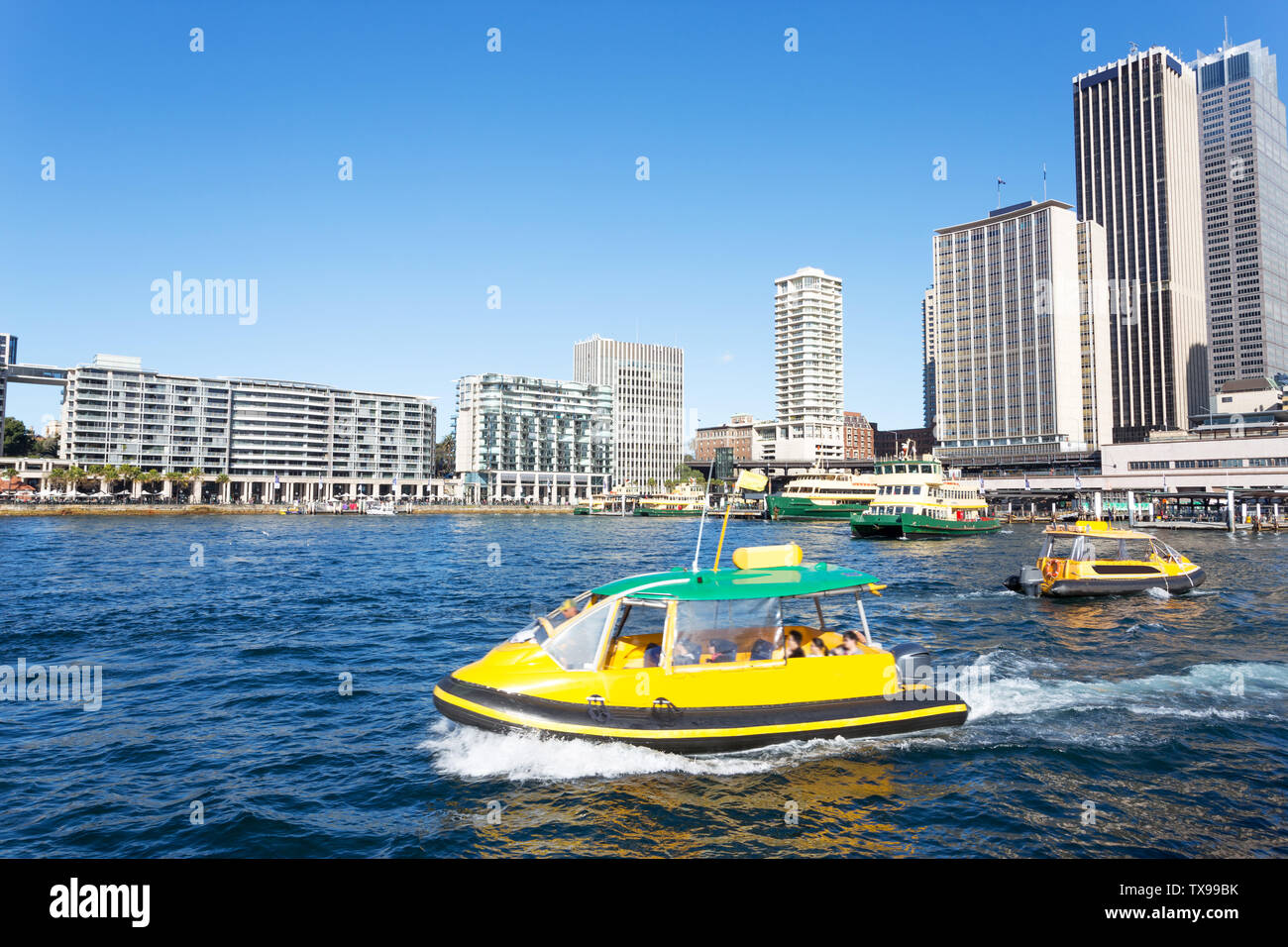 Skyline and office building at seashore Stock Photo - Alamy