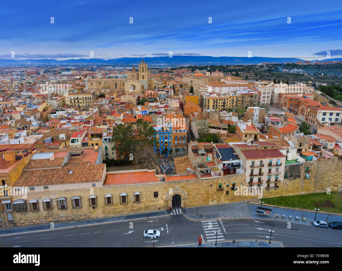 Air view of the gate in the stone wall of the medieval city. Tarragona ...